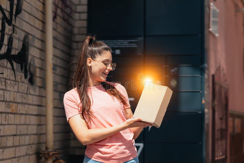 Woman Preparing Parcel for Shipment To Client Near Post Office Stock ...