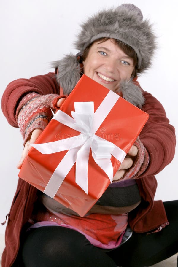 Woman with present stock image. Image of christmas, happy - 35125727