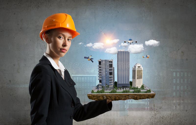 Woman Presenting Construction Model . Mixed Media Stock Photo - Image ...