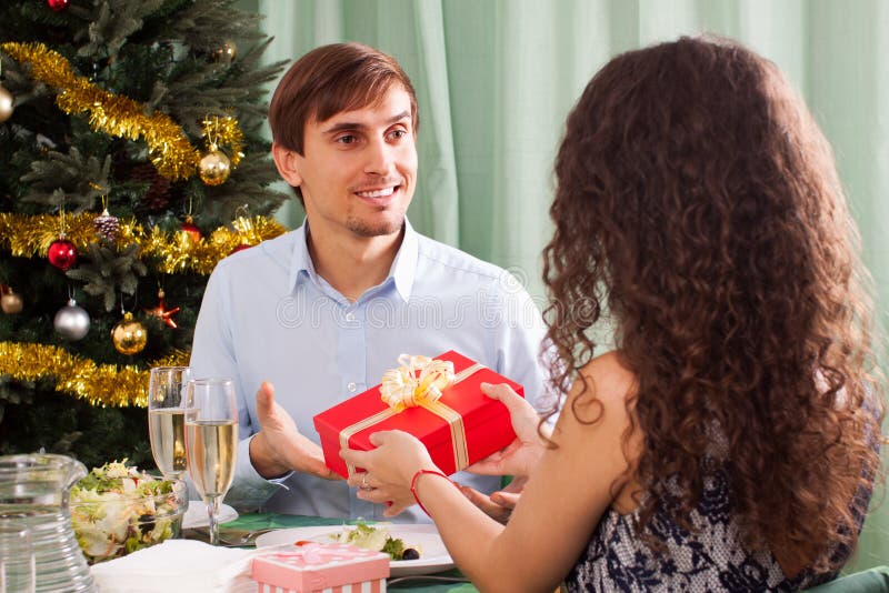 Woman Presenting Gift To Man Stock Image - Image of people, giving ...