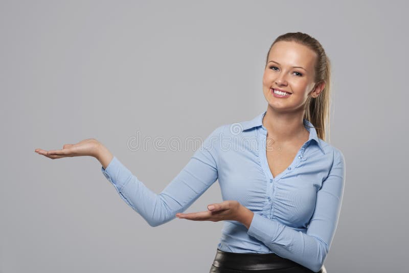 Woman presenting something stock photo. Image of happiness - 35569096