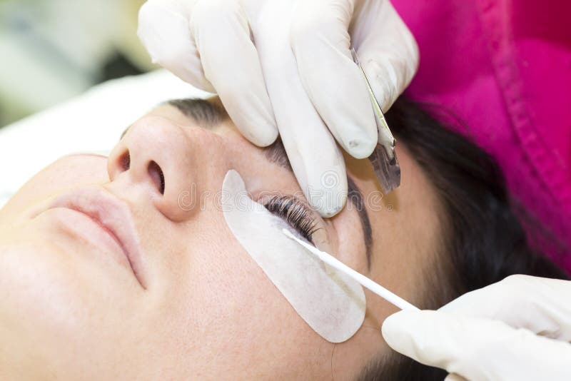 Woman on the Procedure for Eyelash Extensions Stock Photo - Image of ...
