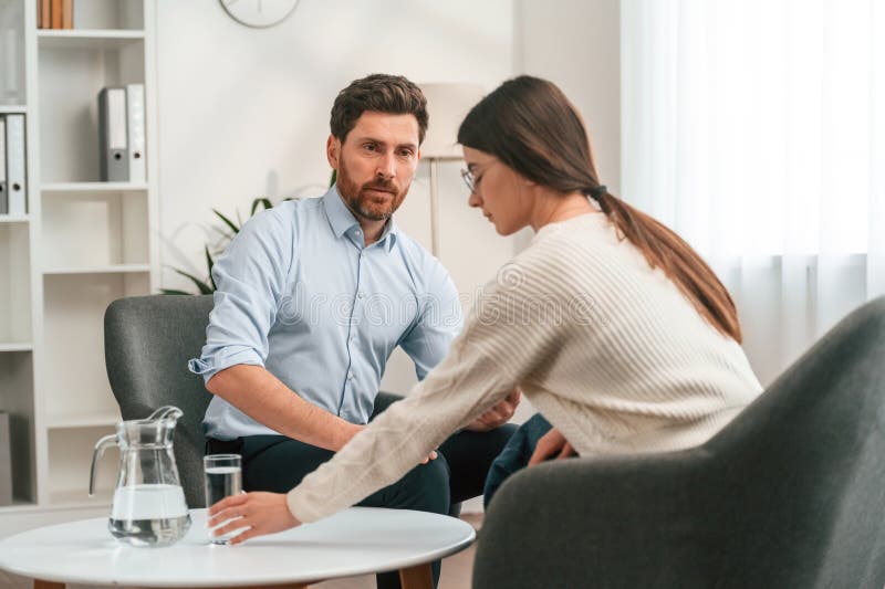 With Woman. Psychologist is Working in the Cabinet Stock Image - Image ...