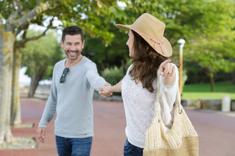 Woman Pulling Husband by Hand Stock Image - Image of passion ...
