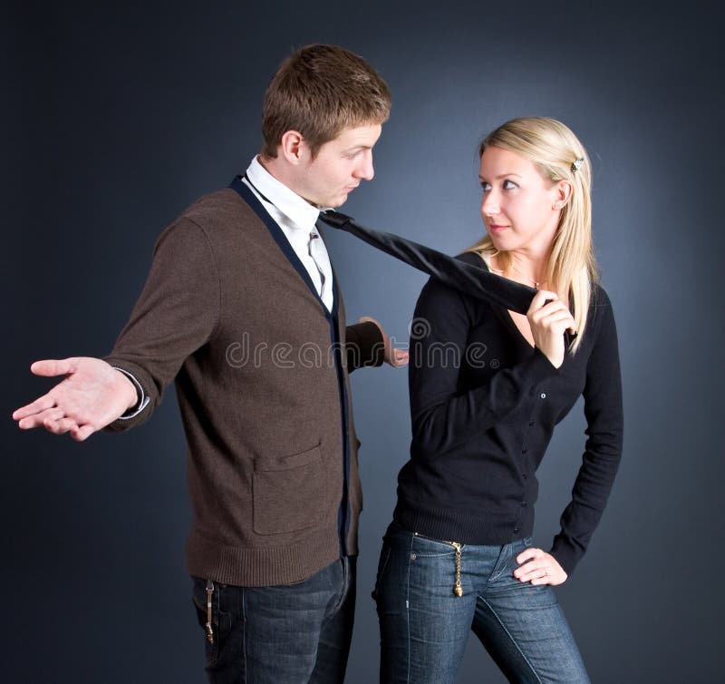 Woman pulling a man stock image. Image of human, male - 6594751