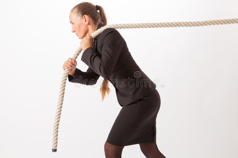 A Woman is Pulling at a Thick Rope Stock Photo - Image of woman, pull ...