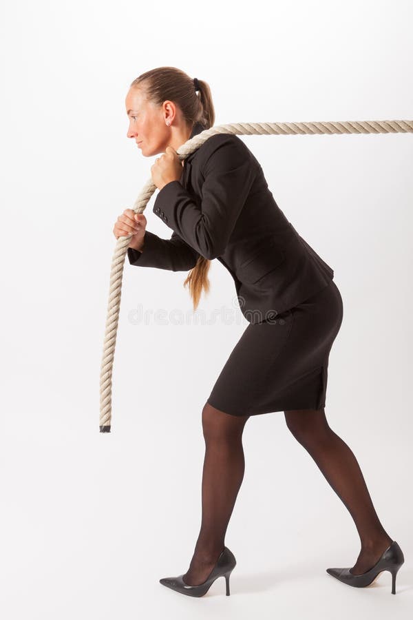 A Woman is Pulling at a Thick Rope Stock Photo - Image of woman, firm ...