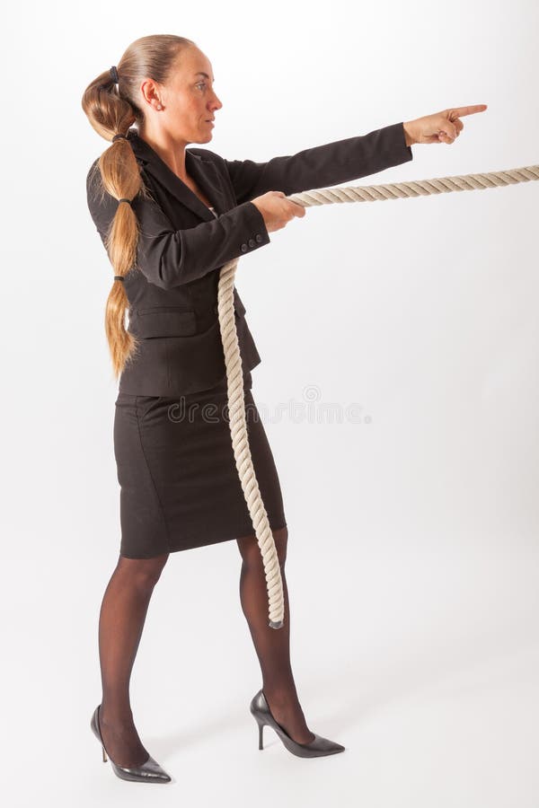 A Woman is Pulling at a Thick Rope Stock Photo - Image of woman, pull ...