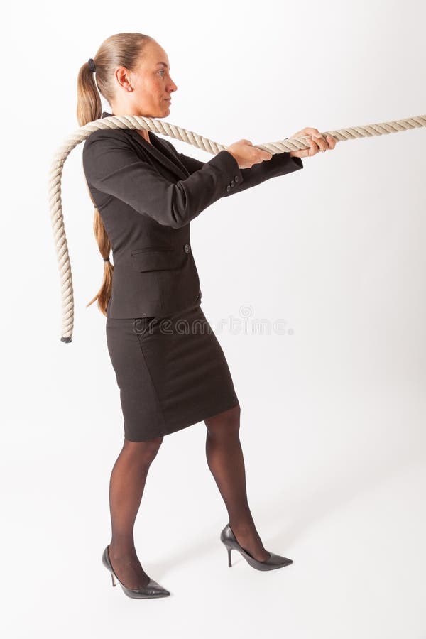 A Woman is Pulling at a Thick Rope Stock Photo - Image of woman, pull ...