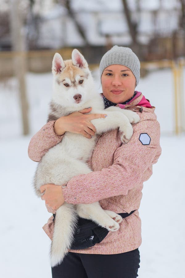Woman with Puppy Siberian Husky Stock Photo - Image of smile, puppies ...