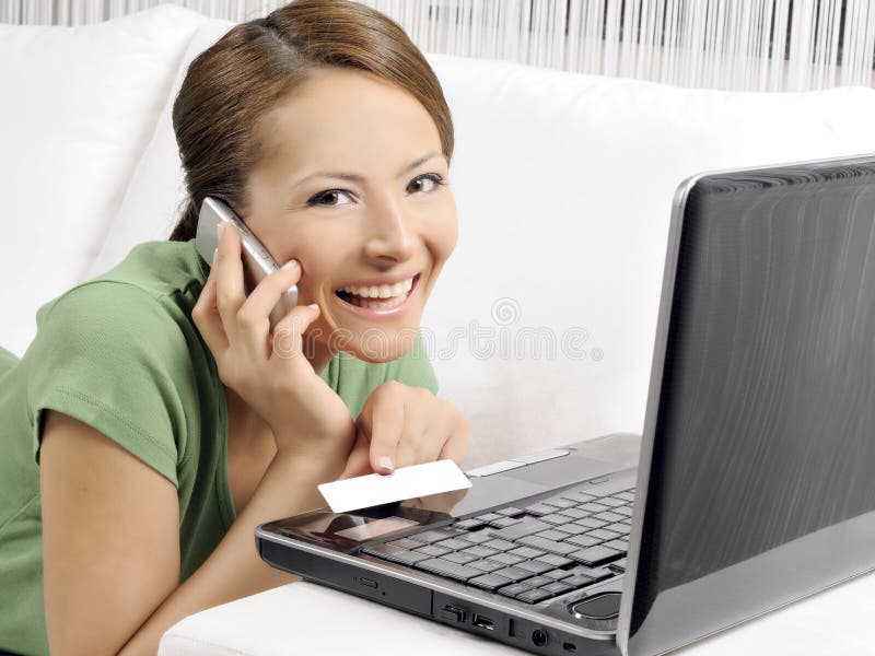 Woman Purchasing Product Using Her Laptop Computer Stock Photo - Image ...