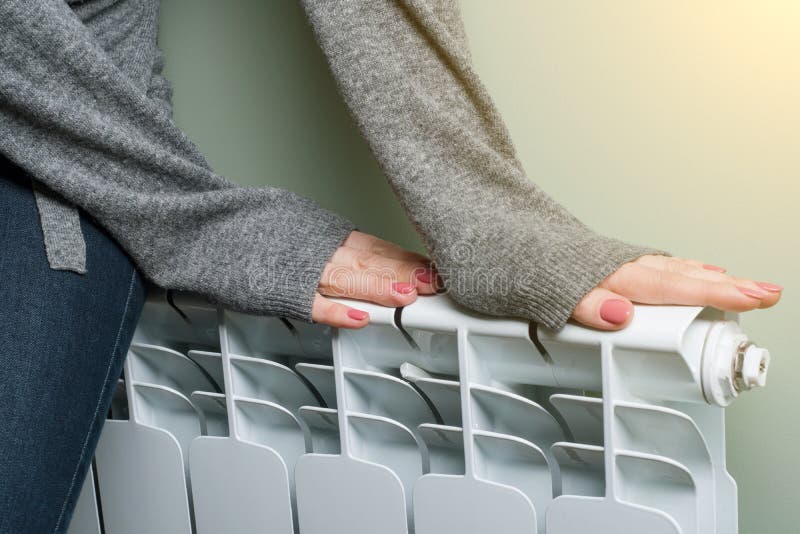 Woman Put Her Hands on the White Radiator Stock Image - Image of object ...