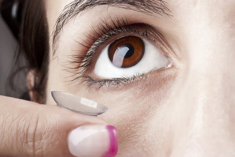 Woman Puts on a Contact Lens Stock Image - Image of contact, eyewear ...