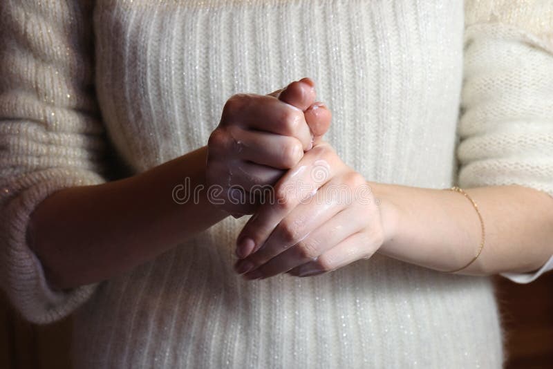 Woman Puts Cream on Her Hands. Hand Care Concept Stock Image - Image of ...