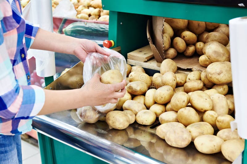 Woman Puts Potatoes Package Stock Photos - Free & Royalty-Free Stock ...
