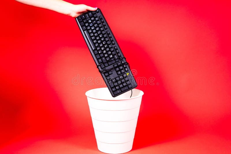 Woman Putting a Computer Keyboard in the E-waste Trash Bin, Recycling ...