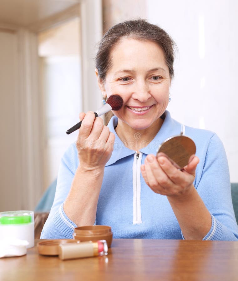 Woman Putting Facepowder on Face Stock Image - Image of pretty, making ...
