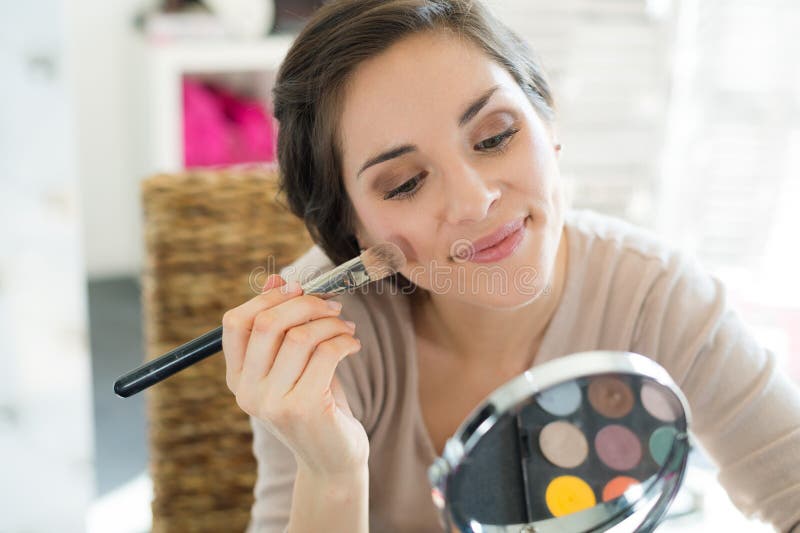 Woman Putting Make Up on Face Stock Photo - Image of contour, beautiful ...