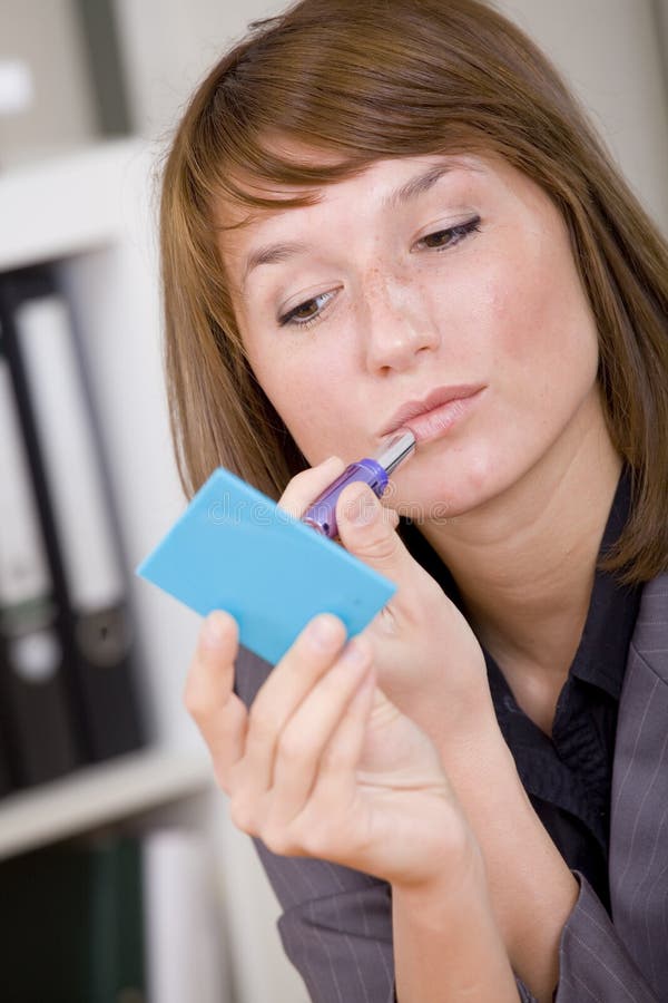 Woman Putting on Makeup by Office Work Stock Image - Image of mirror ...