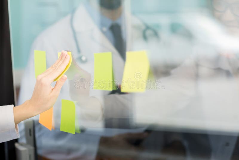 Woman Putting Notes on Door Stock Image - Image of door, healthcare ...