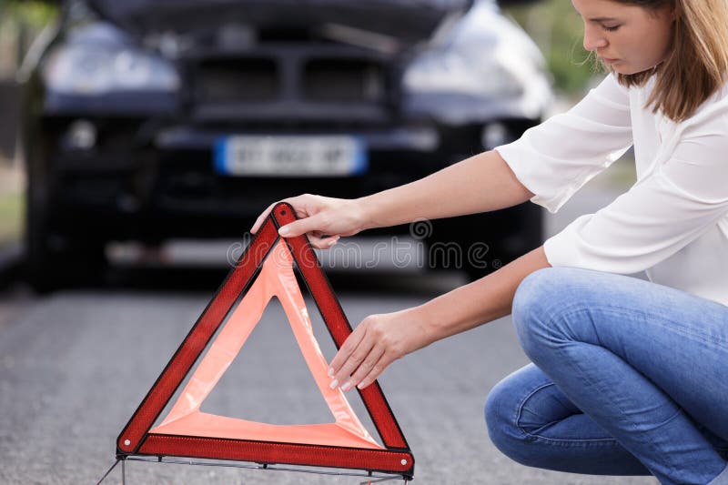 Woman Putting Safety Red Triangle Stock Image - Image of phone ...