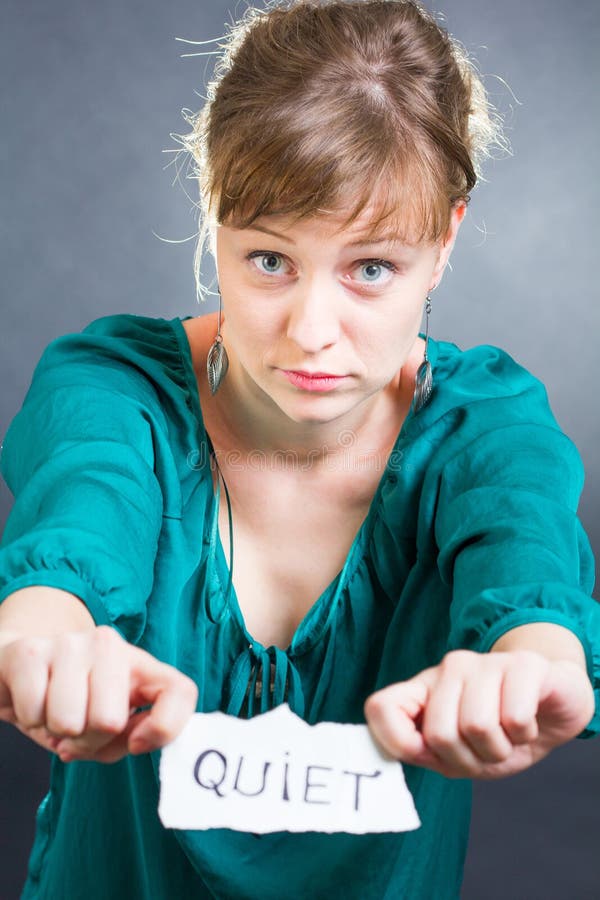 Woman with a QUIET note stock image. Image of hairstyle - 45839957