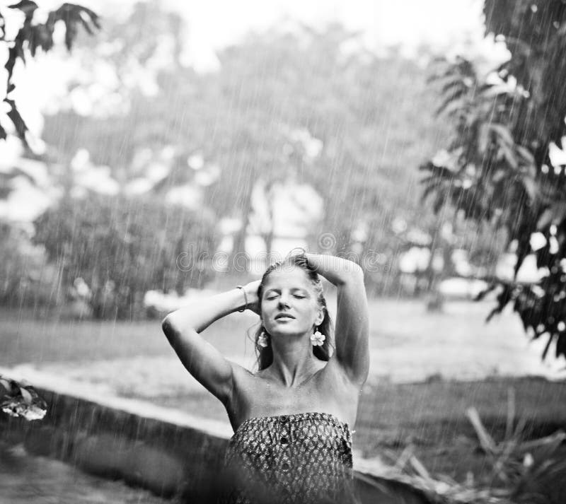 Woman in the rain stock image. Image of tropical, white - 25305447