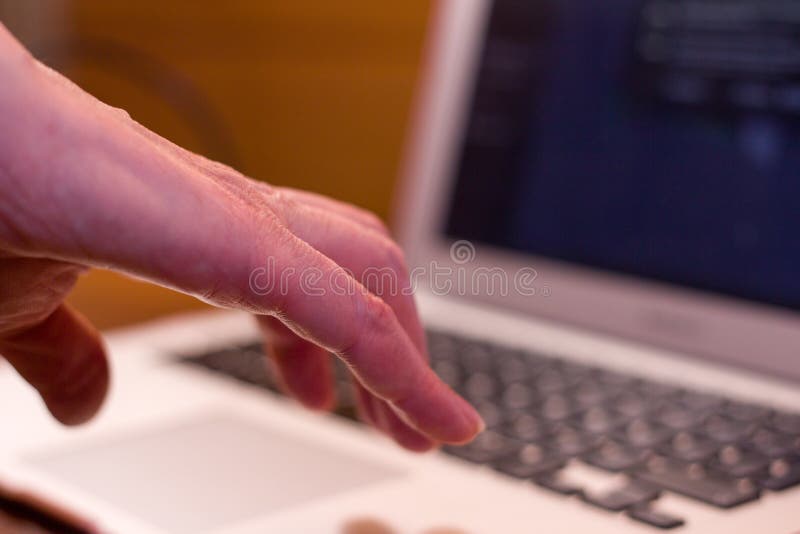 Woman Reaches for a Laptop Keyboard. Computer Literacy Training Concept ...
