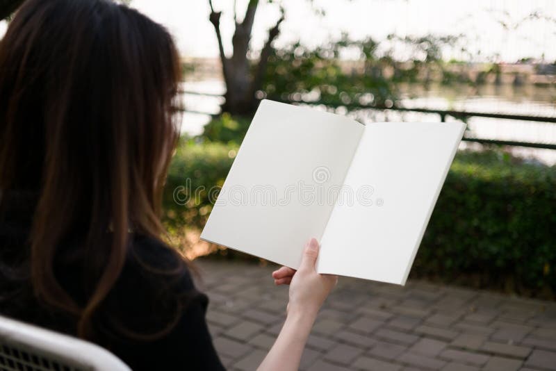Woman Reading Blank Book in Garden Stock Image - Image of note, reading ...