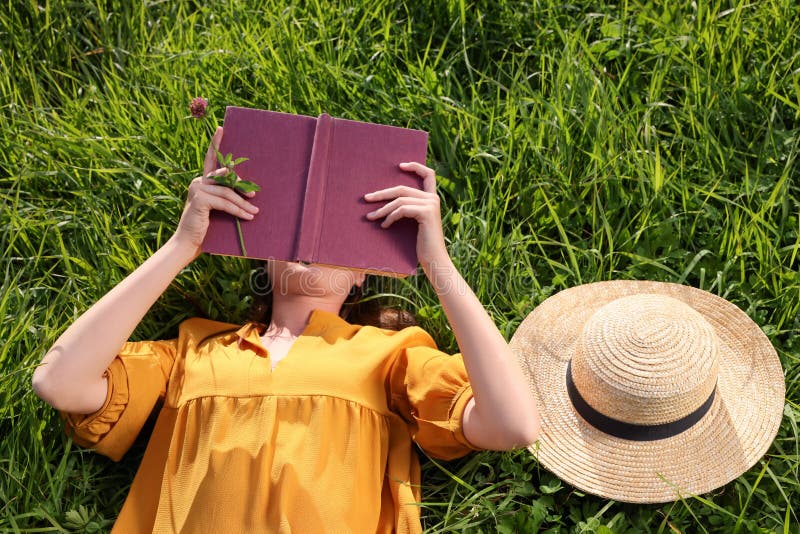 Woman Reading Book on Green Meadow, Above View Stock Photo - Image of ...