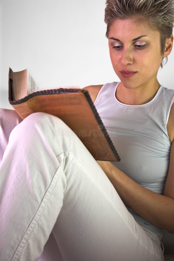 Woman reading a book stock image. Image of blond, face - 67107407