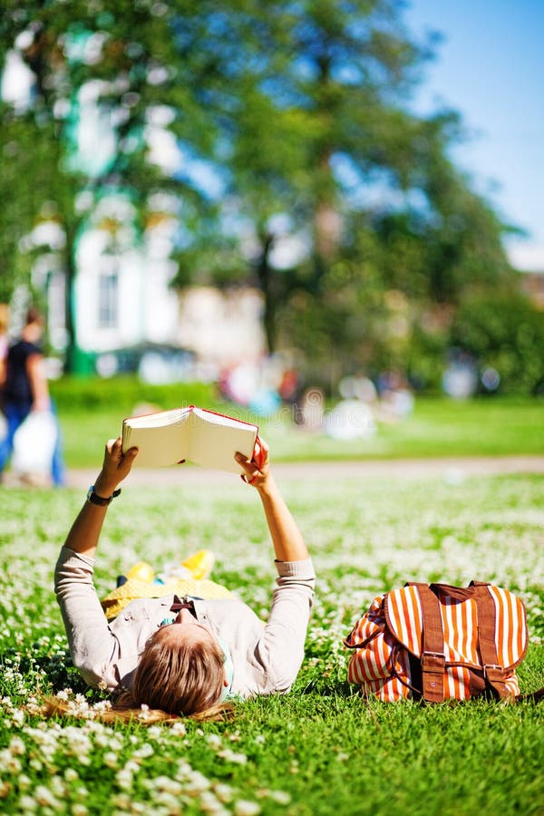 Woman Reading a Book in the Park Stock Image - Image of college ...
