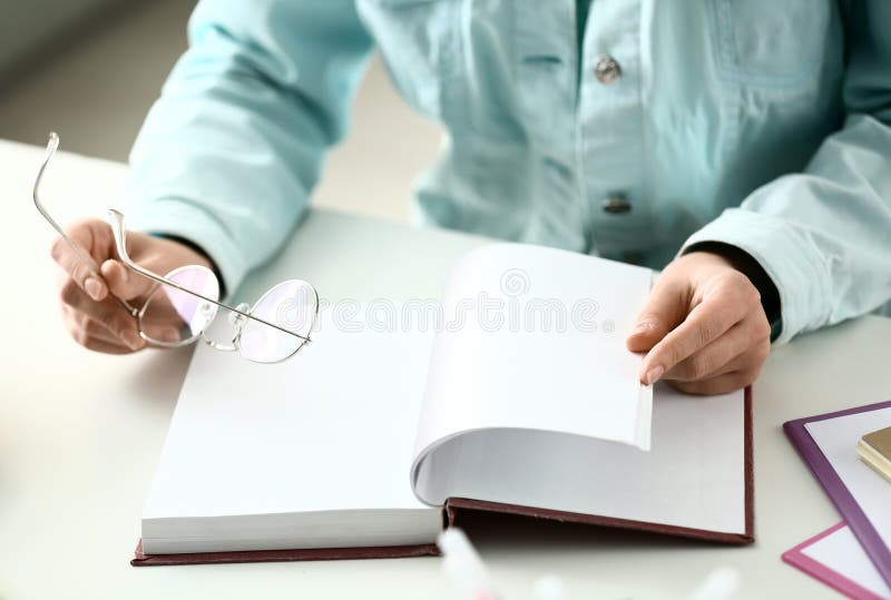 Woman Reading Book at Table. Concept of Study Stock Photo - Image of ...