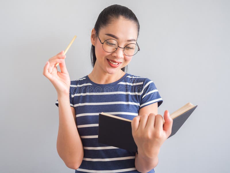 Woman is Reading Book and Think for Ideas. Stock Image - Image of dream ...