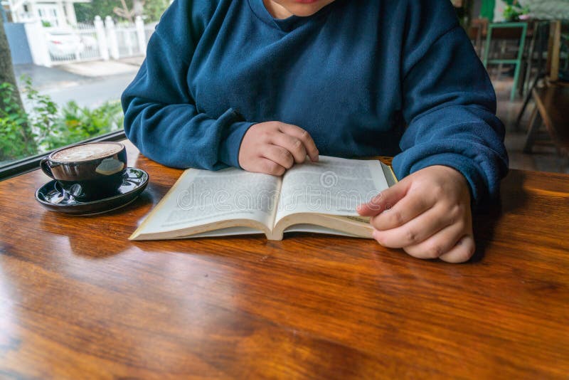 Woman Reading Books on the Wooden Table Stock Photo - Image of reading ...