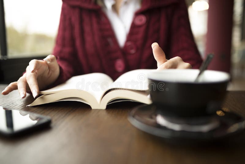 Woman reading at cafe stock image. Image of retro, glass - 81504797