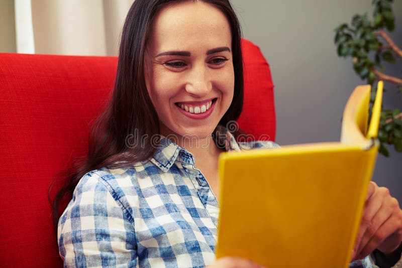 Woman Reading Funny Book and Laughing Stock Image - Image of holding ...