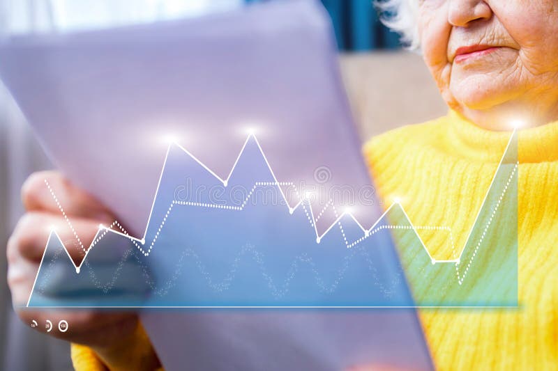 A Woman is Reading a Graph on a Piece of Paper Stock Image - Image of ...