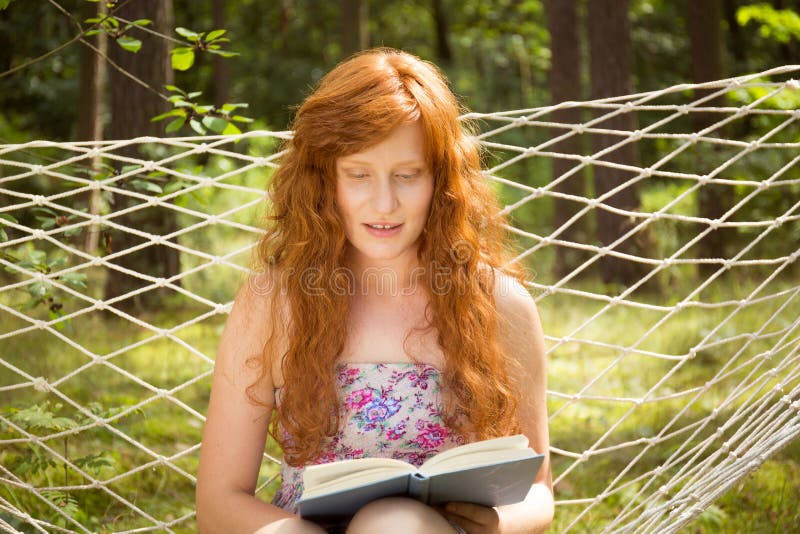 Woman Reading on a Hammock in the Garden Stock Image - Image of ...