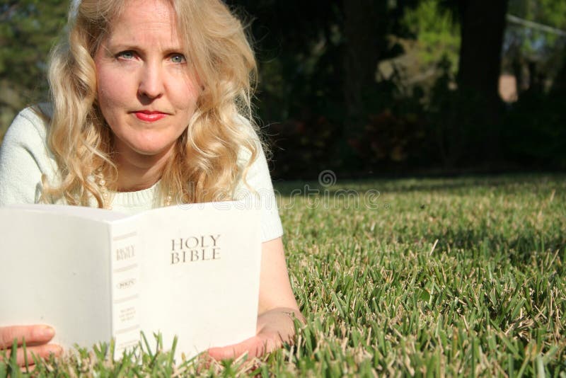 Woman Reading Holy Bible In Gr Stock Image - Image of belief, fresh ...