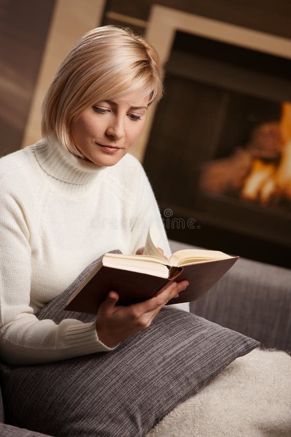 Woman reading at home stock photo. Image of attractive - 11774978