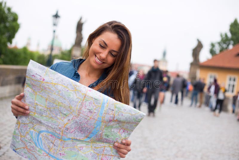 Woman reading a map stock photo. Image of lost, landmark - 72914852