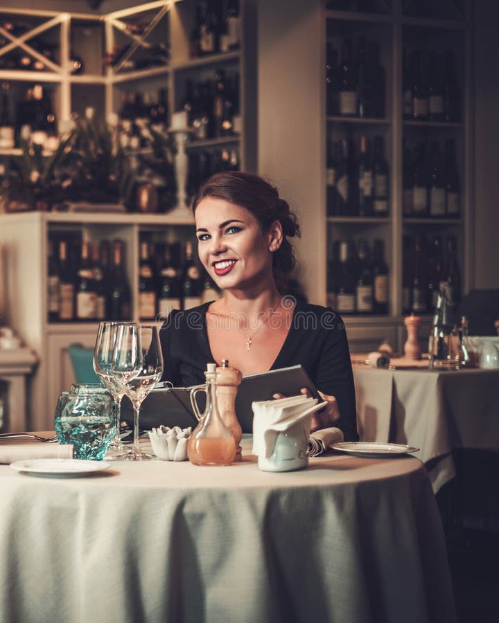 Woman Reading Menu in a Restaurant Stock Image - Image of beautiful ...