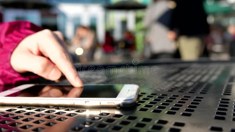 Reading Mobile Phone Message at Rest Area beside Fountain Stock Footage ...