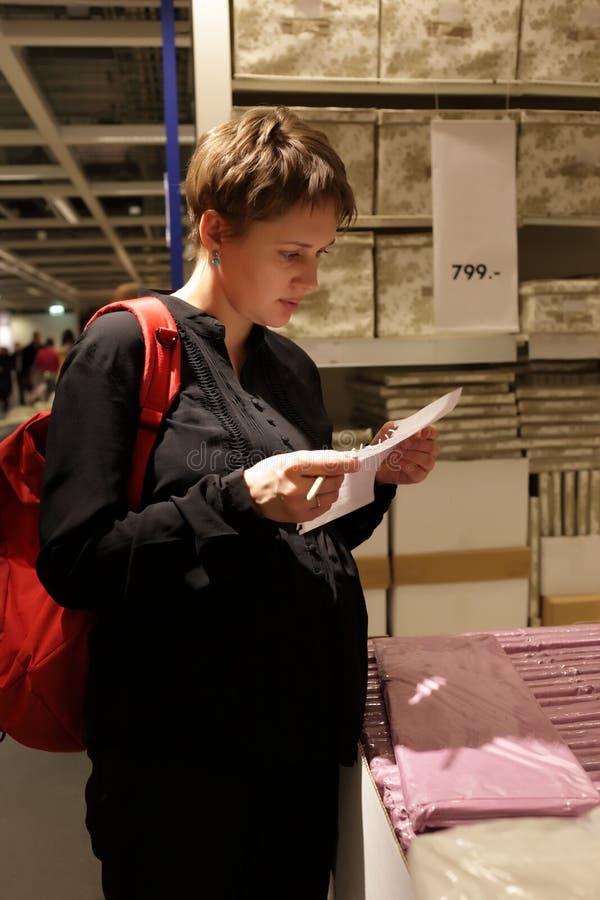 Woman Reading Shopping List Stock Photo - Image of paper, market: 51997722