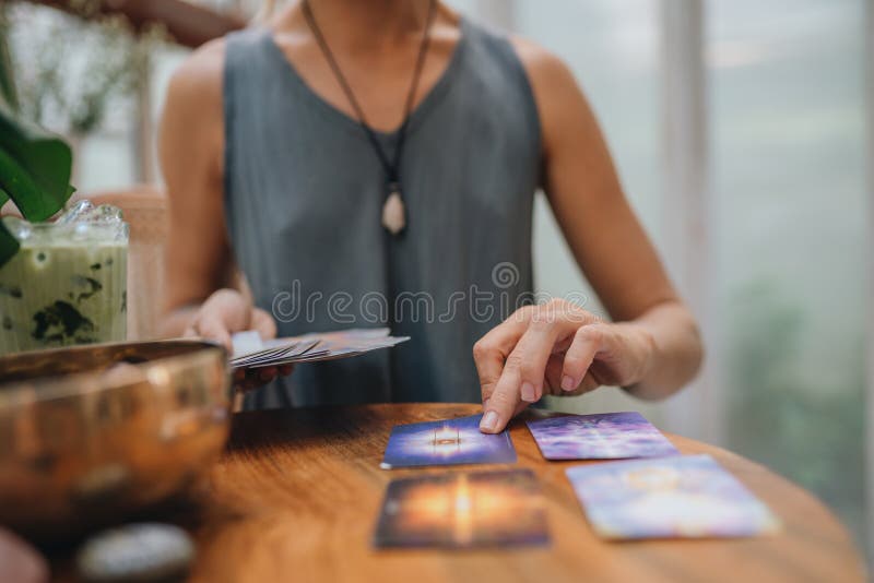 Woman is Reading Tarot Cards on a Table in Cafe Stock Image - Image of ...