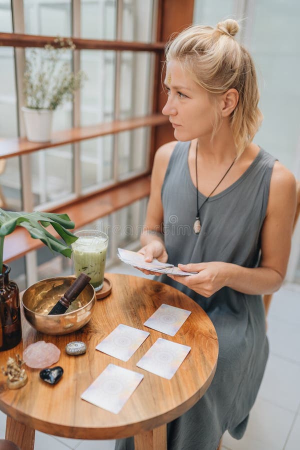 Woman is Reading Tarot Cards on a Table in Cafe Stock Photo - Image of ...