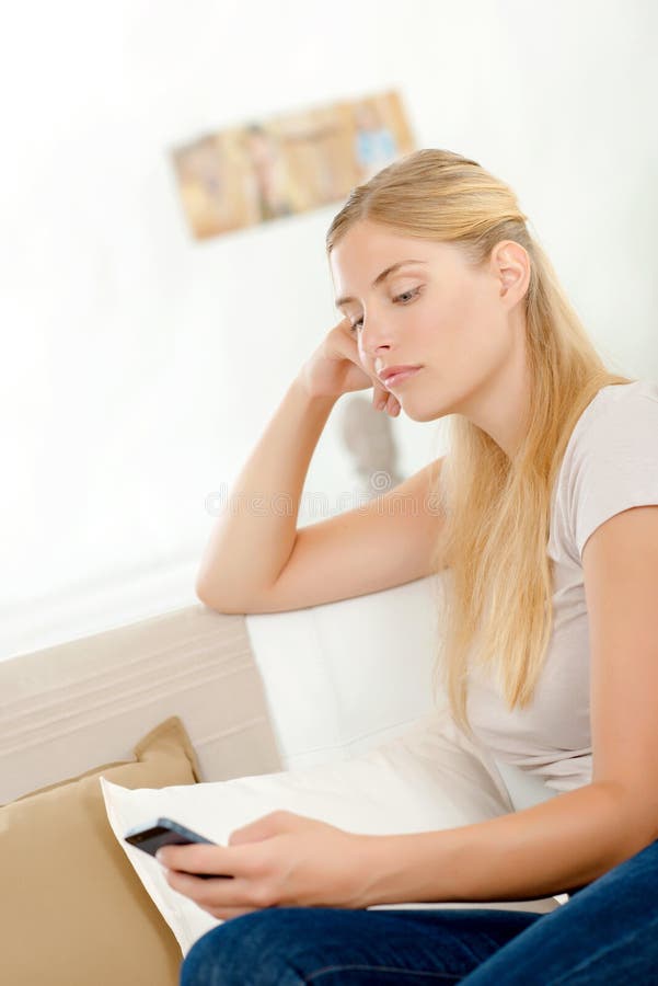 Woman reading text message stock image. Image of mobile - 102275113