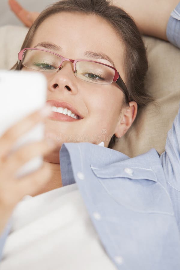 Woman Reading Text Message on a Mobile Phone Stock Photo - Image of ...