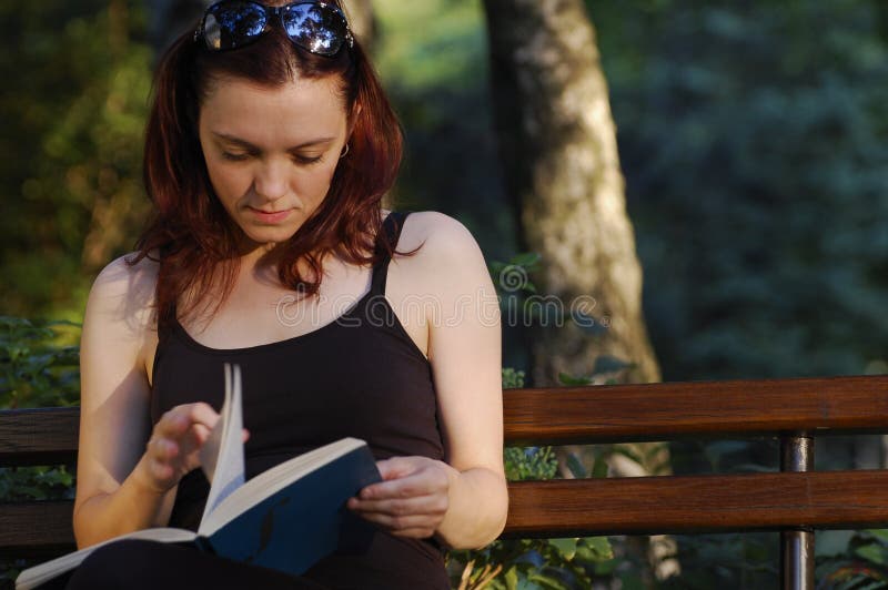 Woman reads in park stock photo. Image of learn, sunny - 60824556